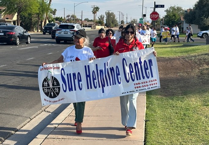 Community Walks in Red Heels to Support Violence Survivors - Imperial ...